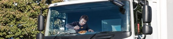 HGV Truck Drivers Cooking Food in Their Trucks